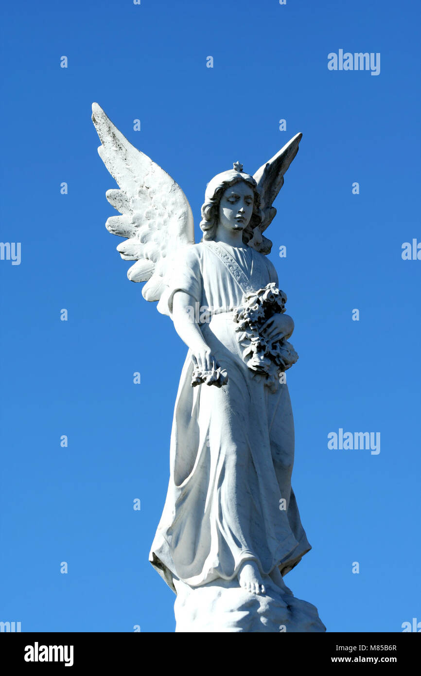 A Angel statue with blue sky Stock Photo - Alamy