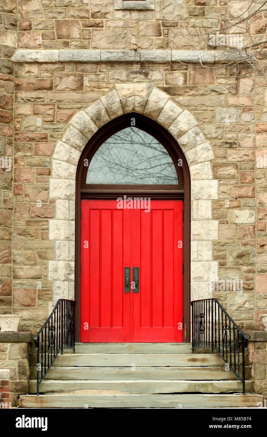 A Red church door with stairs Stock Photo - Alamy