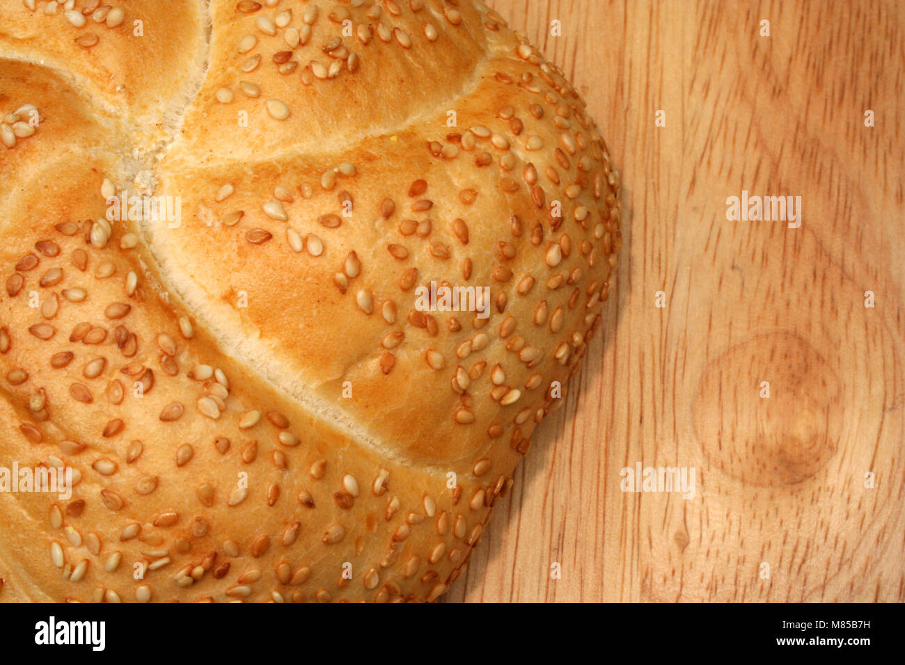 A Fresh bakery roll on a cutting board Stock Photo - Alamy