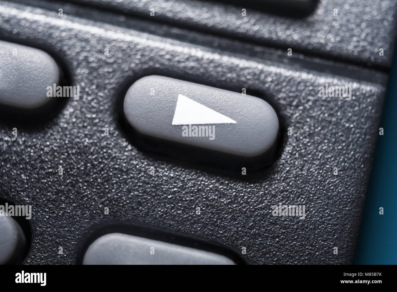 Macro Of A Black Play Button On Black Remote Control For A Hifi Stereo ...