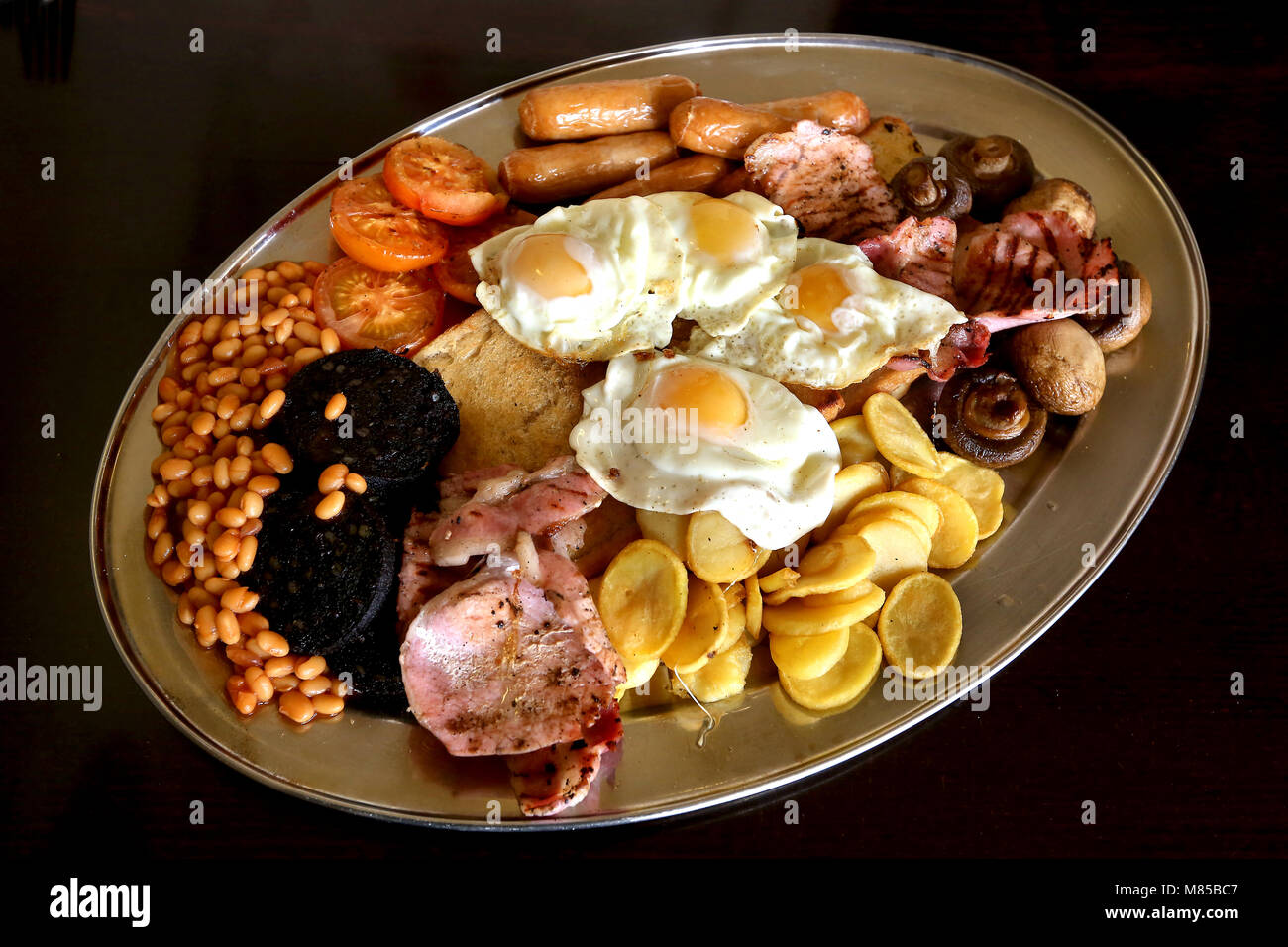 A MEGA fried Full English breakfast cointaining fried eggs, Black ...