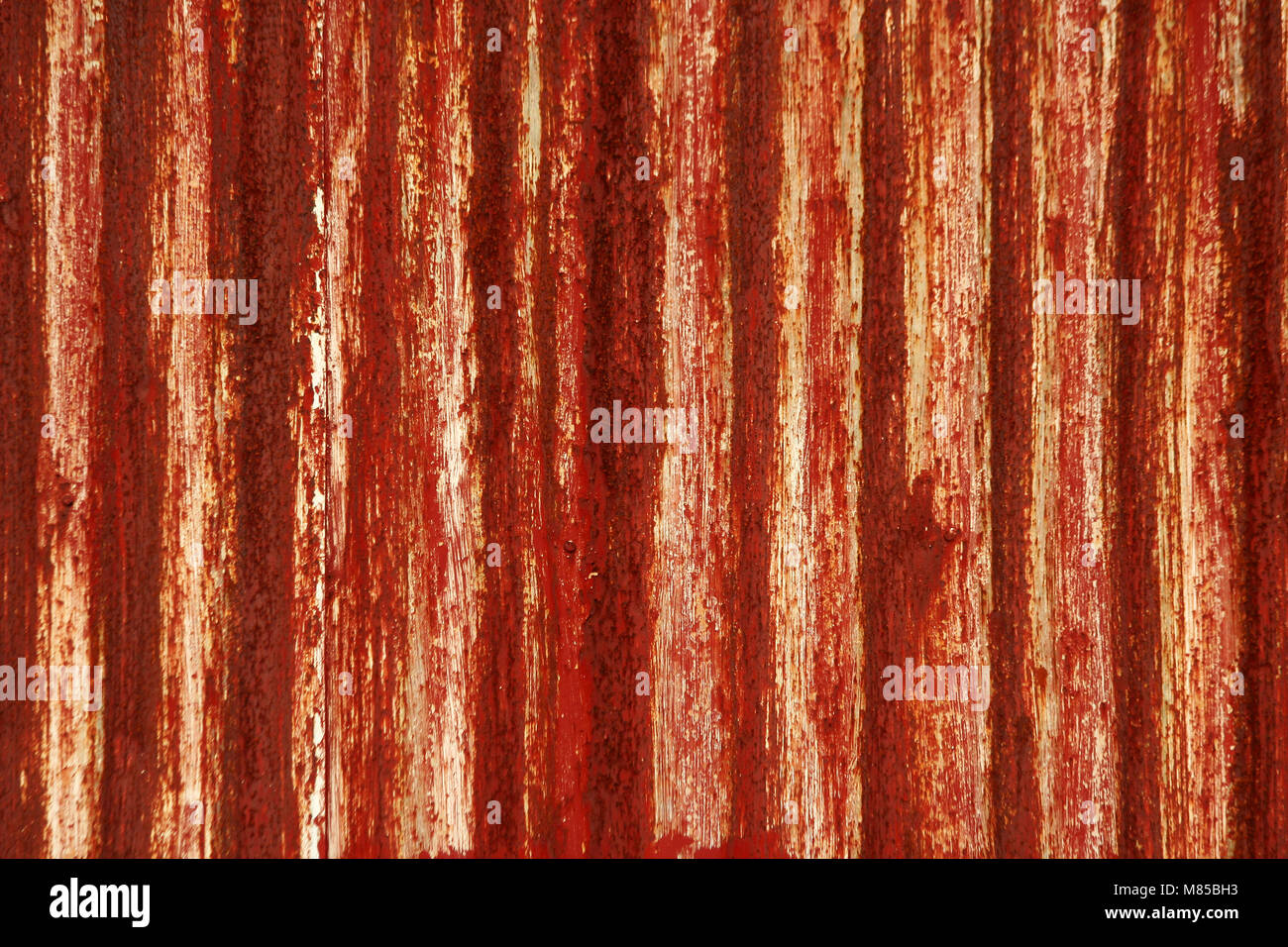 A Weathered paint wall background Stock Photo - Alamy
