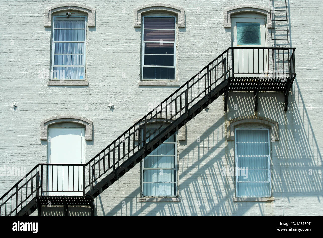 A Fire escape on the side of a building Stock Photo - Alamy