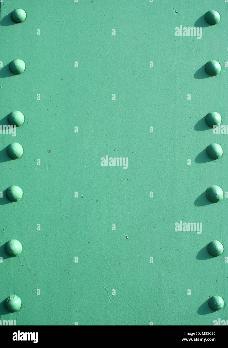 Steel girder with rivets background Stock Photo - Alamy