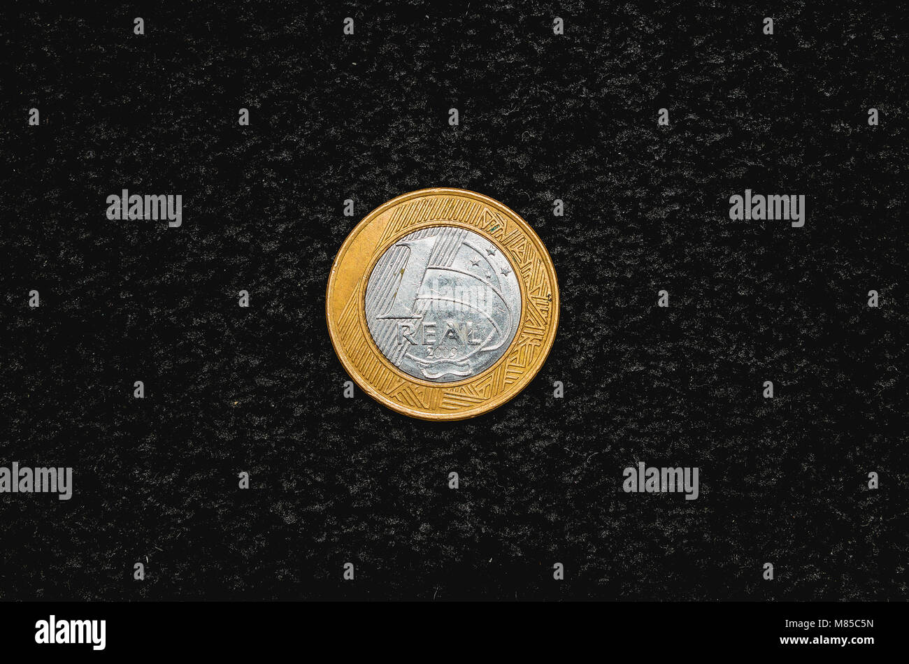 One Real coin, currency from Brazil. Coin on a dark background Stock ...