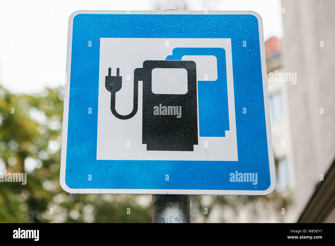 A sign indicating a special place for refueling electric vehicles. A ...