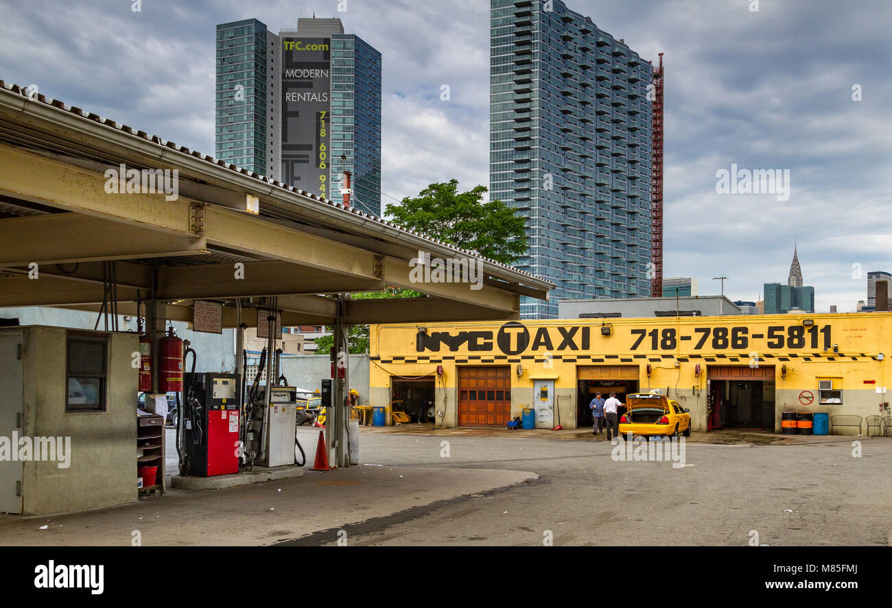Yellow medallion taxi Garage and gas station with The Chrysler Building ...