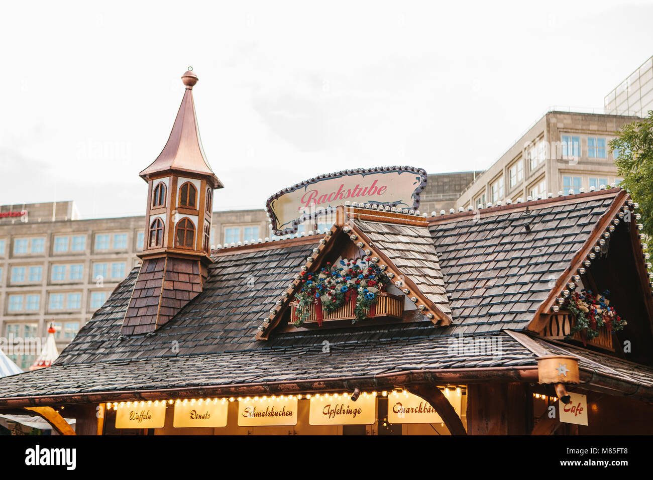 Beautifully decorated roof of a street bakery with an inscription in ...