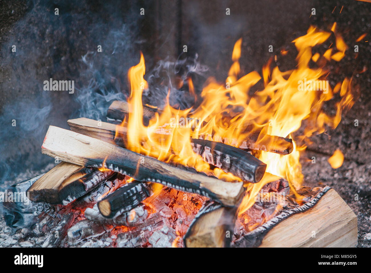 Close - up - fascinating and warming fire burns in spacious stove on ...