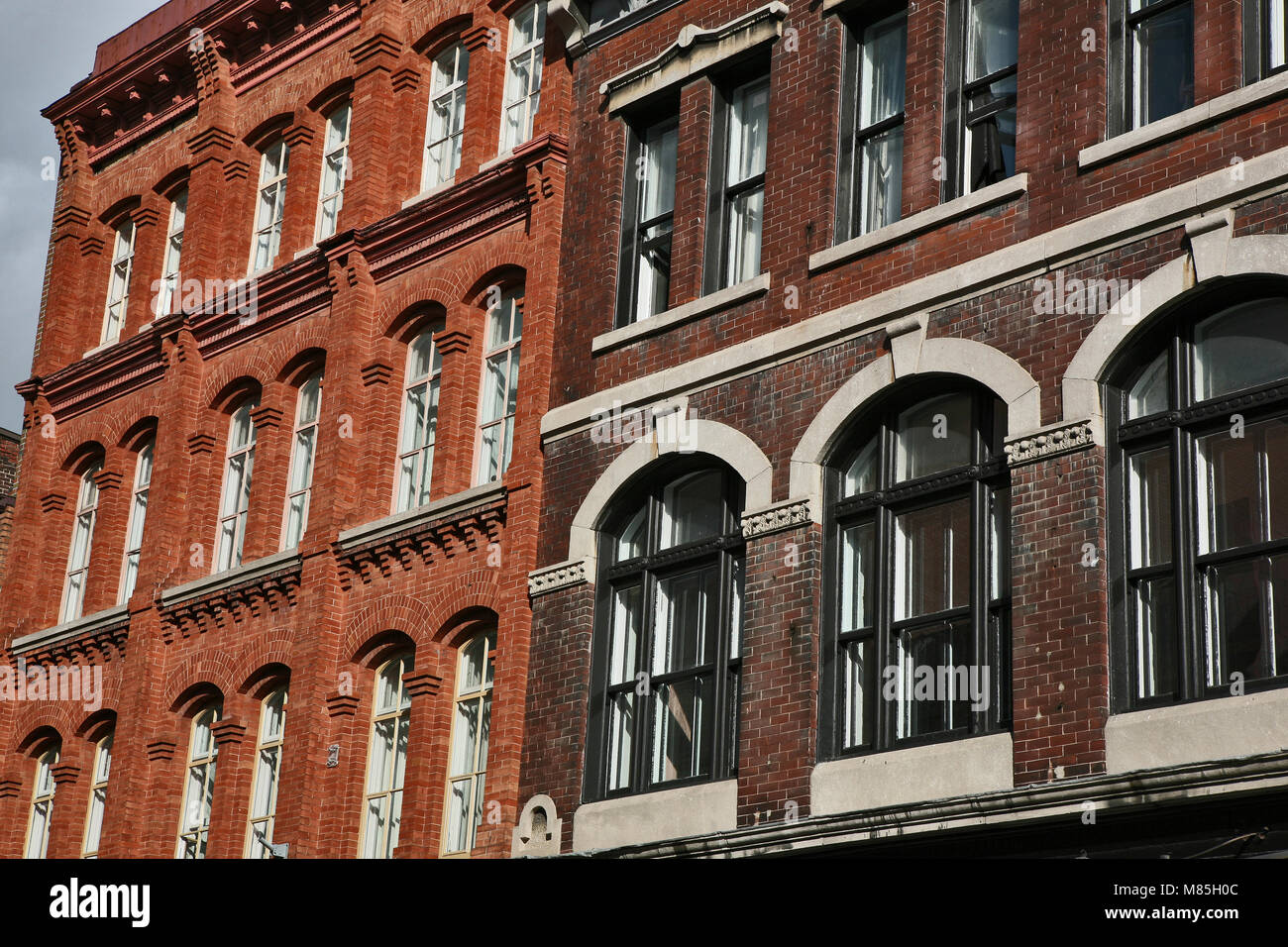 vintage brick business buildings in old Quebec city Stock Photo - Alamy