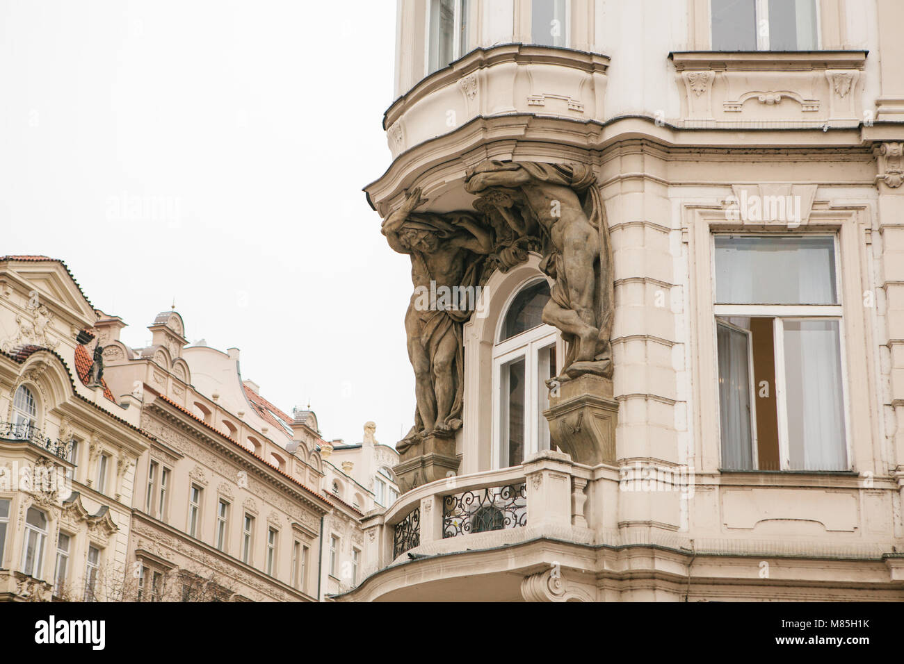 European architecture. Close-up - sculptures - columns in the form of ...