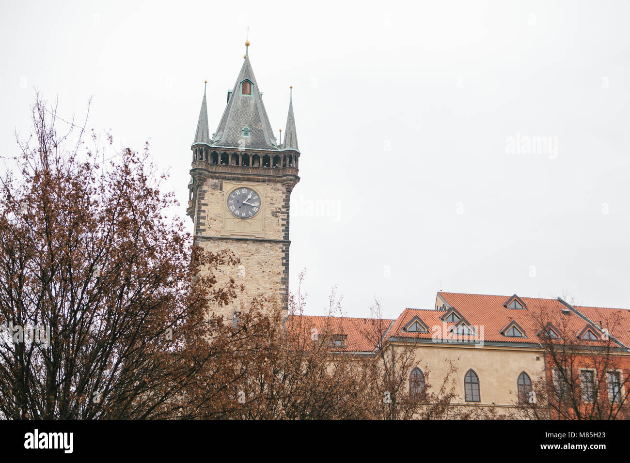 Beautiful historic buildings with red tiles on the roof and the clock ...