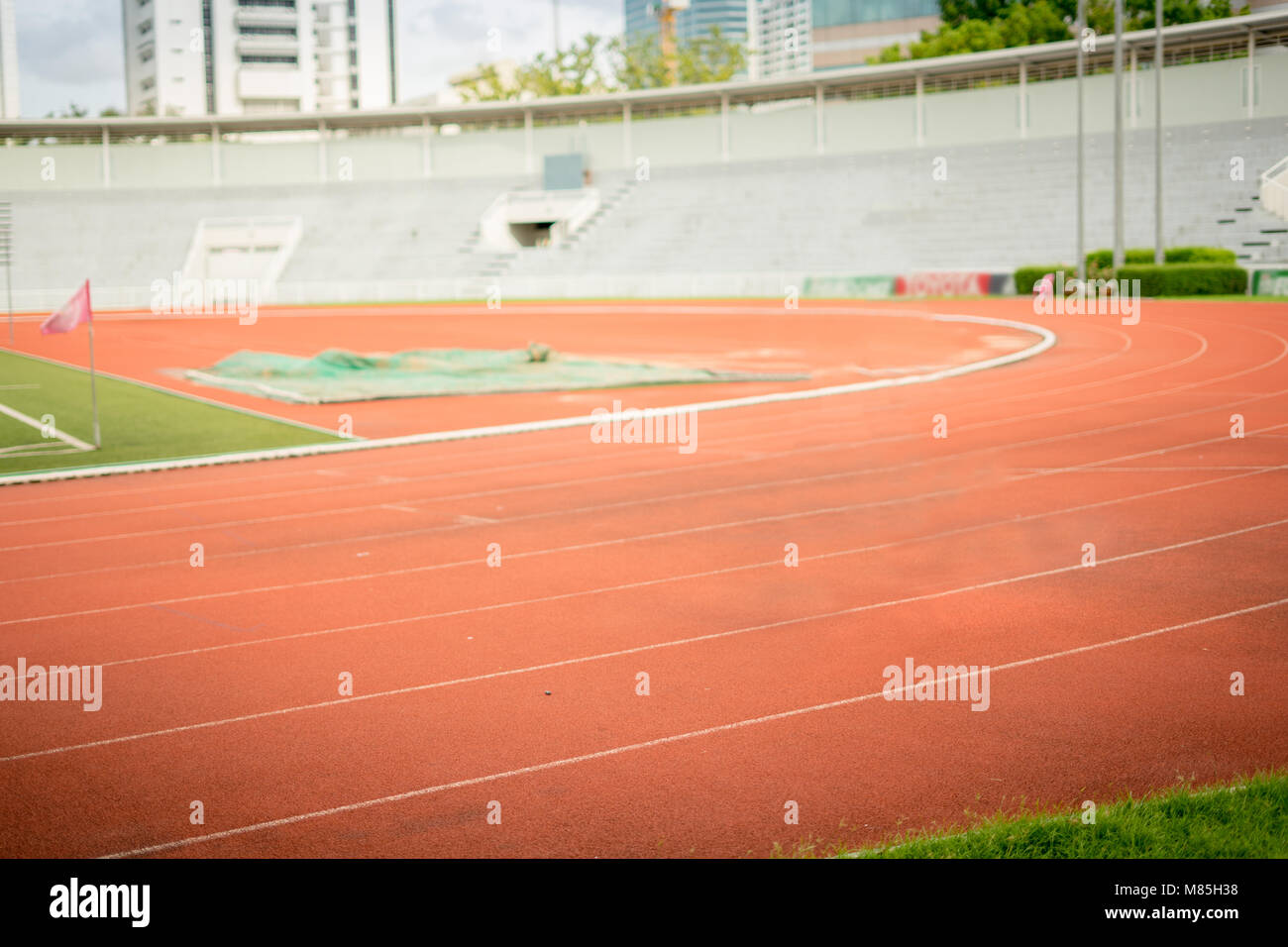 Red running track in stadium Stock Photo - Alamy Red running track in stadium Stock Photo - Alamy