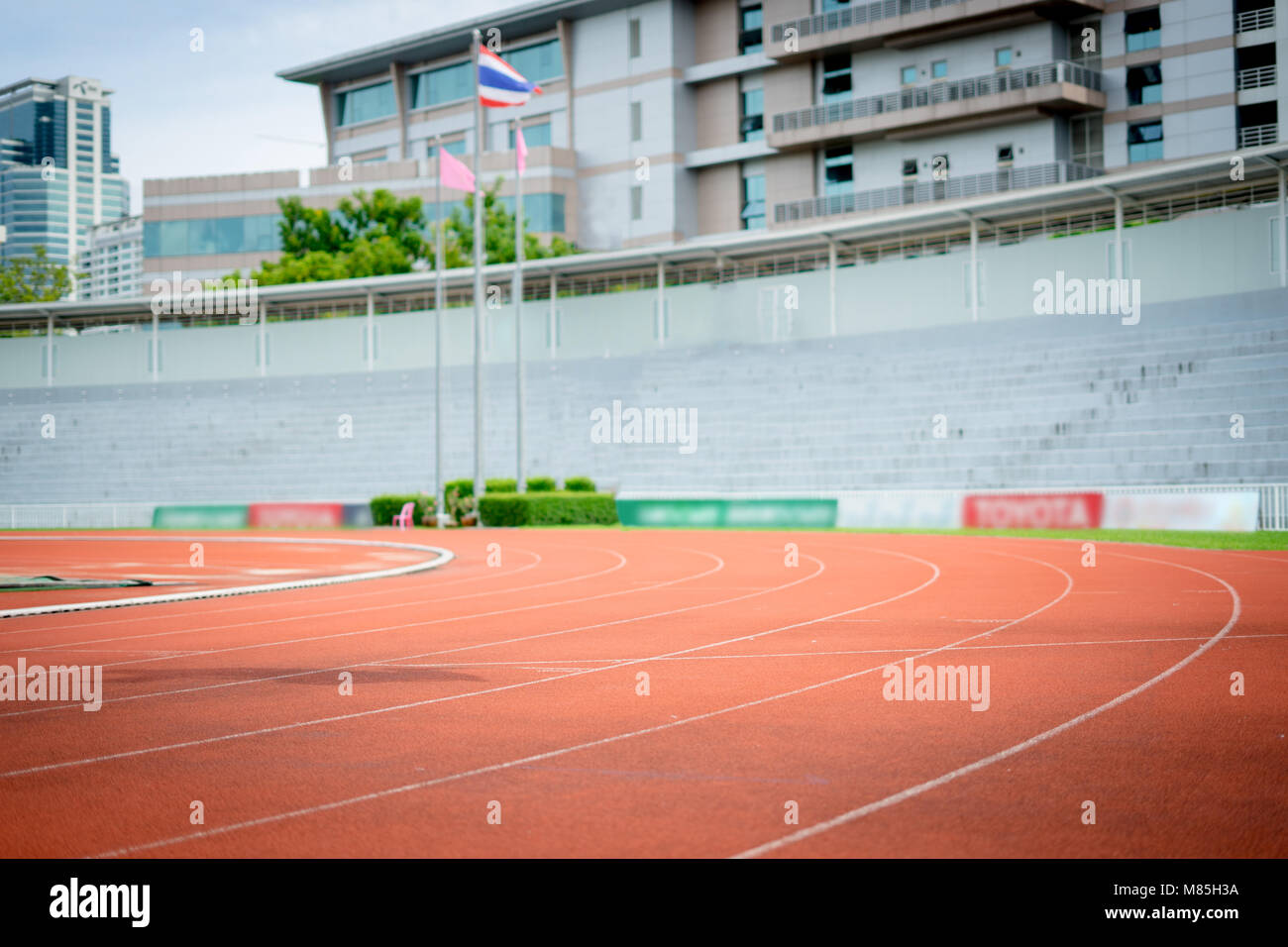 Red running track in stadium Stock Photo - Alamy Red running track in stadium Stock Photo - Alamy