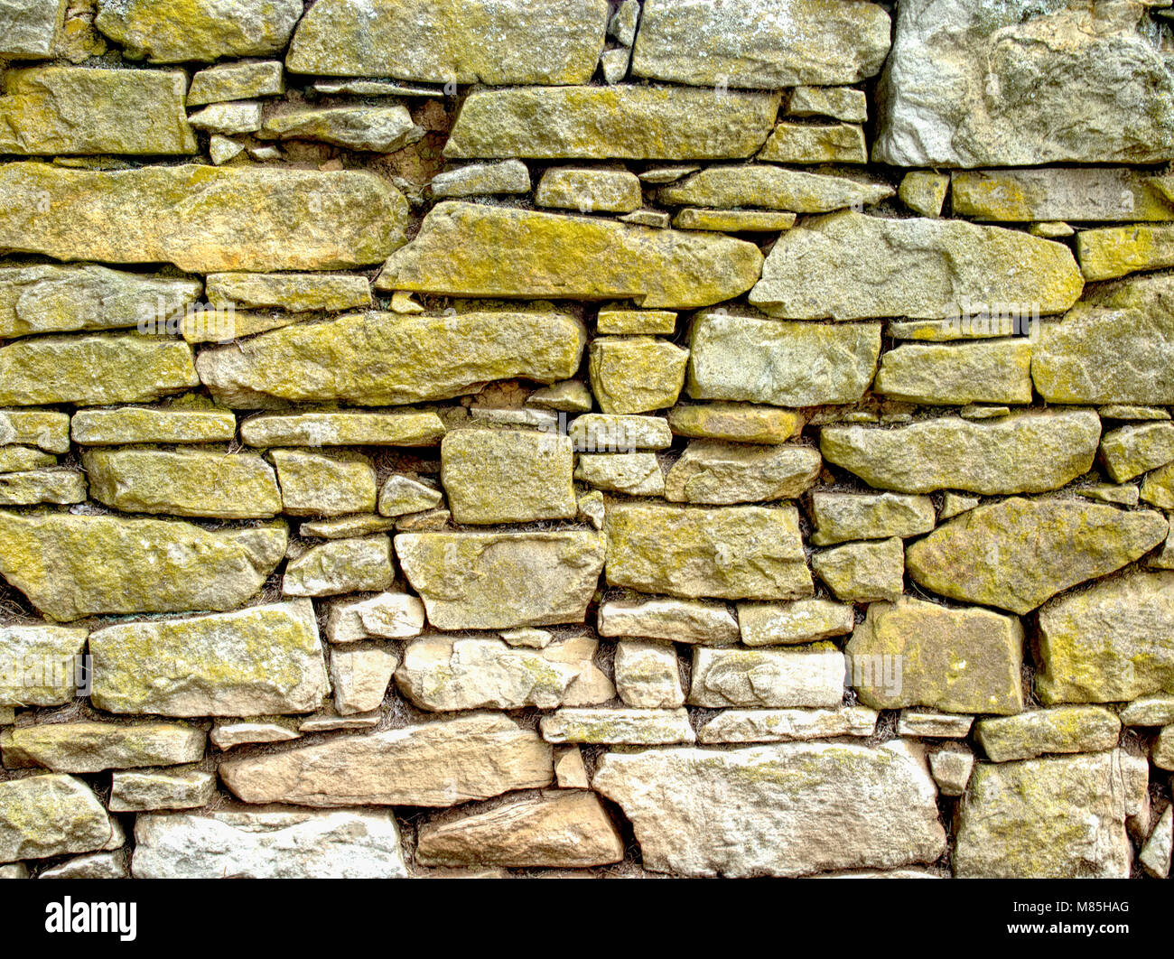 A section of a stone wall Stock Photo - Alamy