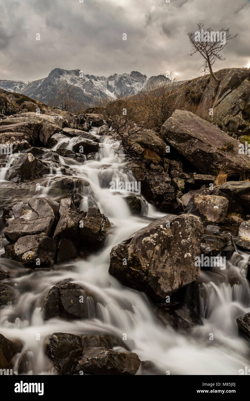 Small waterfall and rocks near Llyn Idwal, Snowdonia, North Wales on a ...