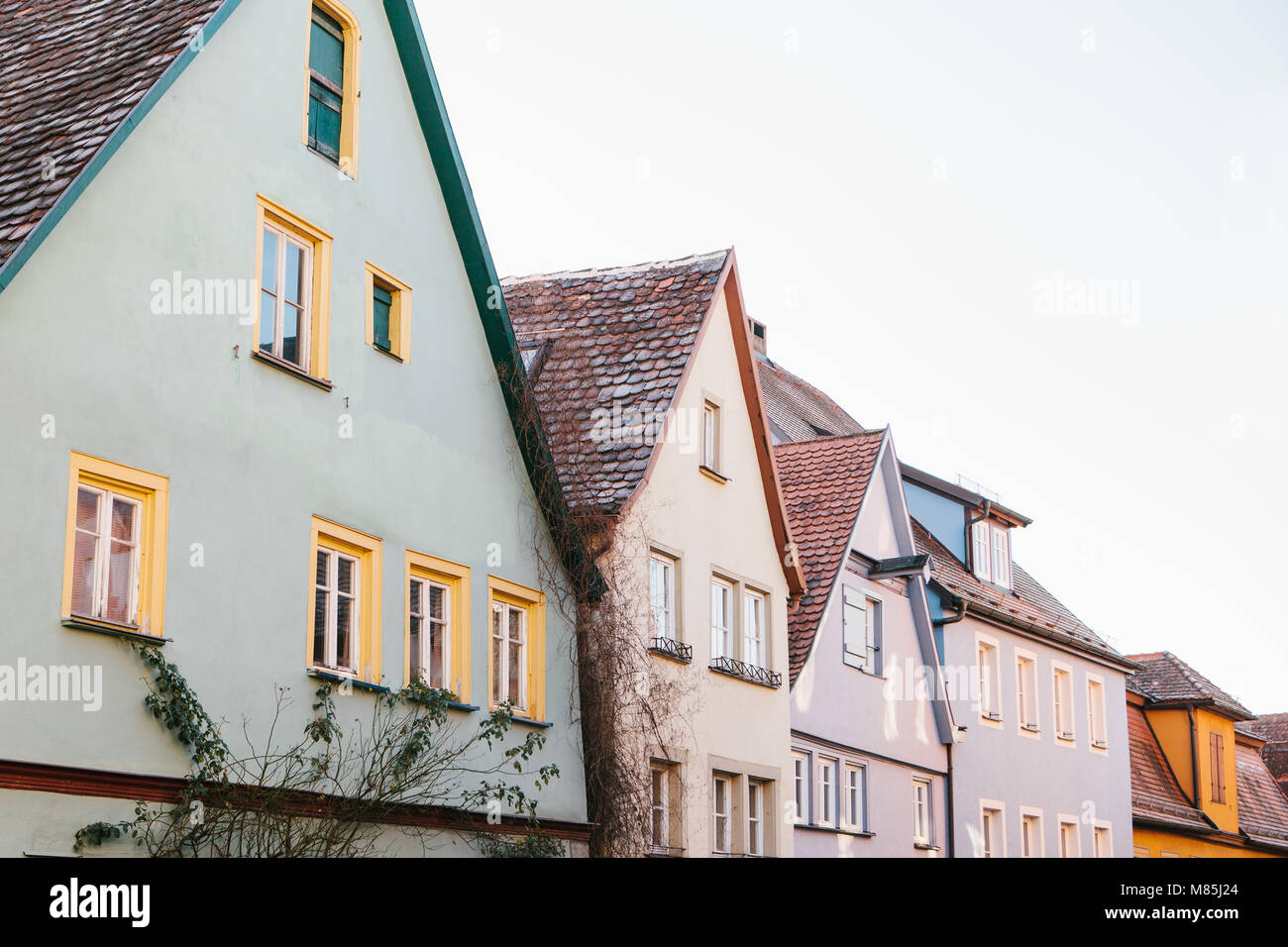 Street with beautiful colorful houses in a row in Rothenburg ob der ...