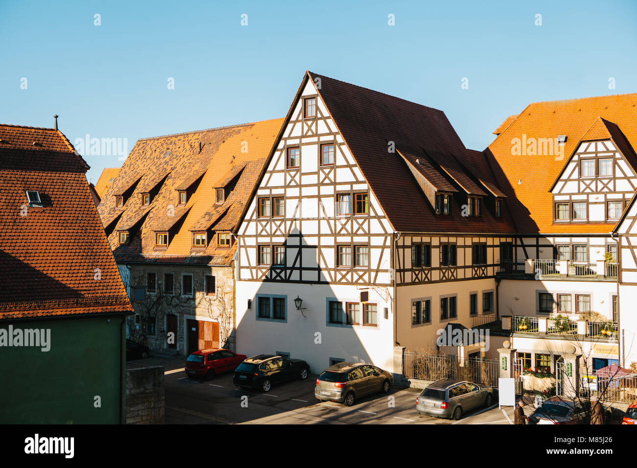 View of a beautiful street with traditional German houses in Rothenburg ...