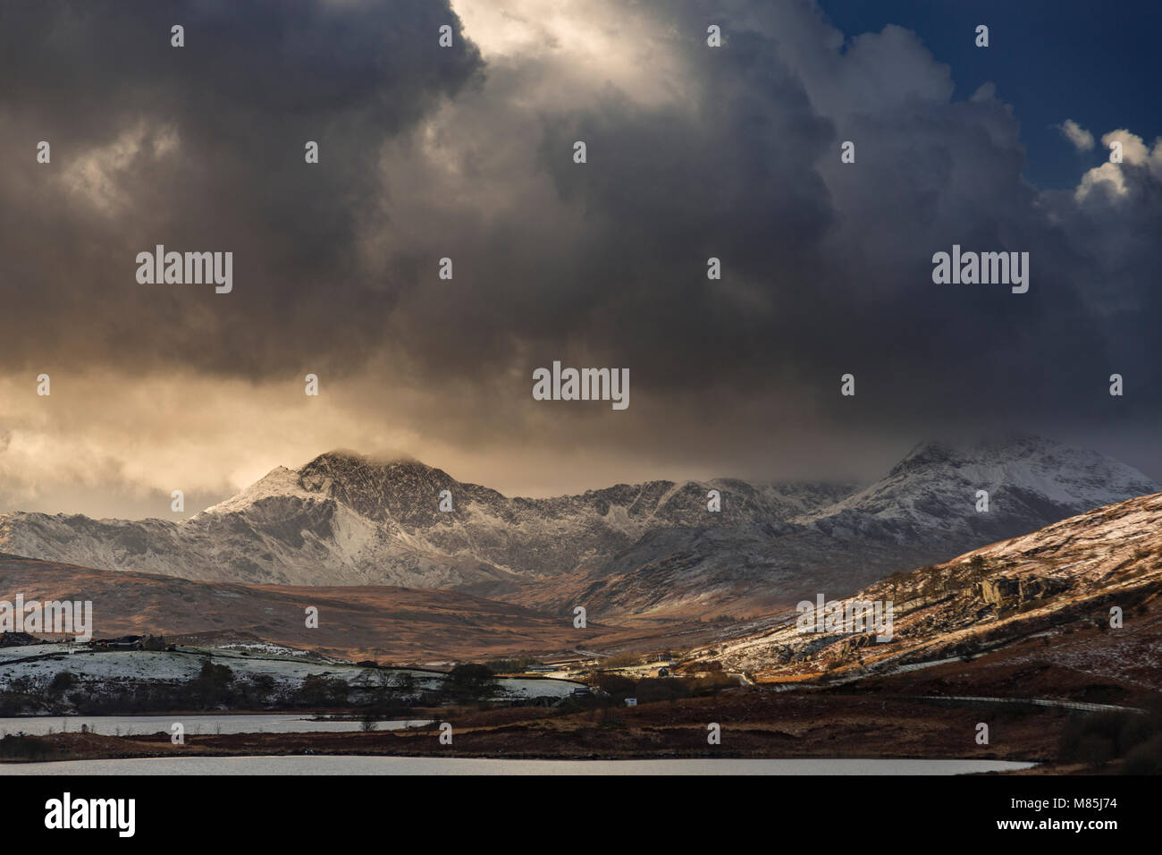 Storm clouds over Snowdon Horeshoe mountains in Snowdonia, North Wales ...