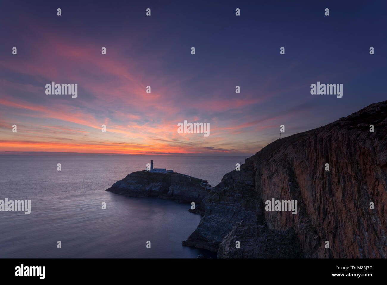South Stack lighthouse at sunset, Anglesey, North Wales coast Stock ...