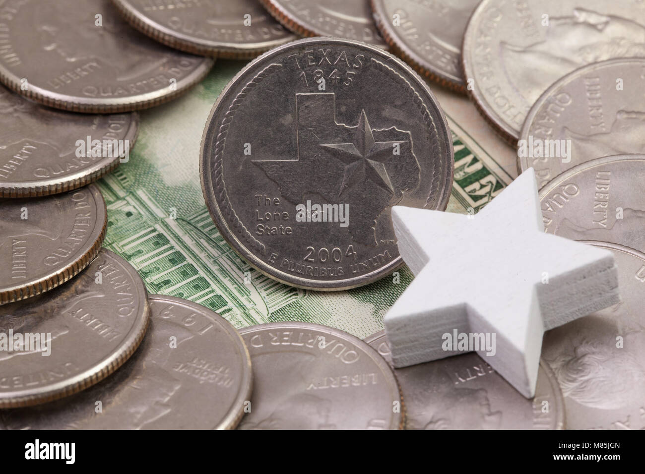 A quarter of Texas, quarters of USA and white star. A circle of the US ...