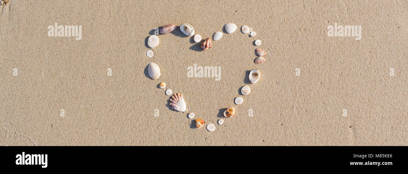 Heart shaped from shells lies on a beach in the sand on Koh Samui Stock ...