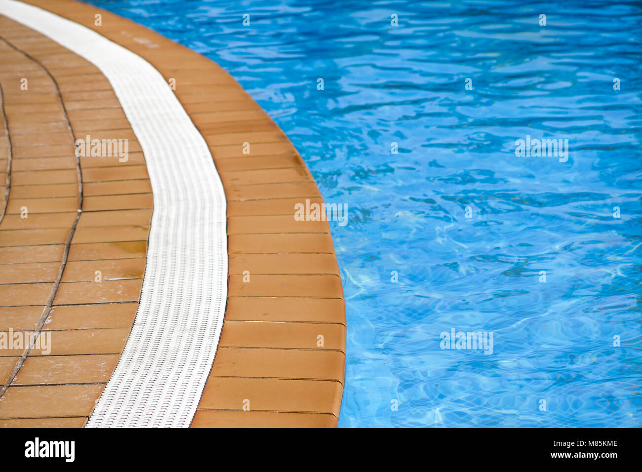 blue water and stone edge pool abstract background Stock Photo - Alamy