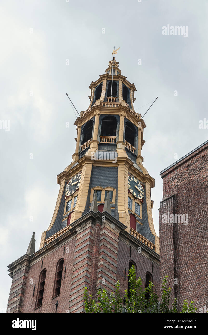 a beautiful view of an old church steeple where the dials of the clock ...