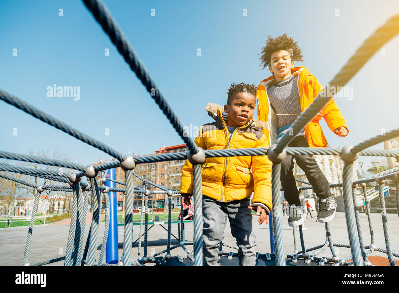 Black children jumping on bed hi-res stock photography and images - Alamy