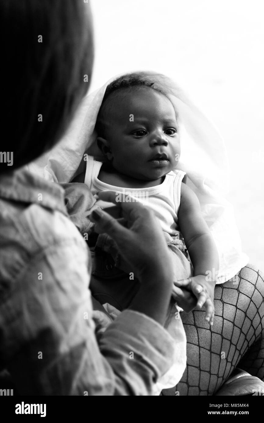 Savona, Italy - September 3, 2017: Little African Child with young ...