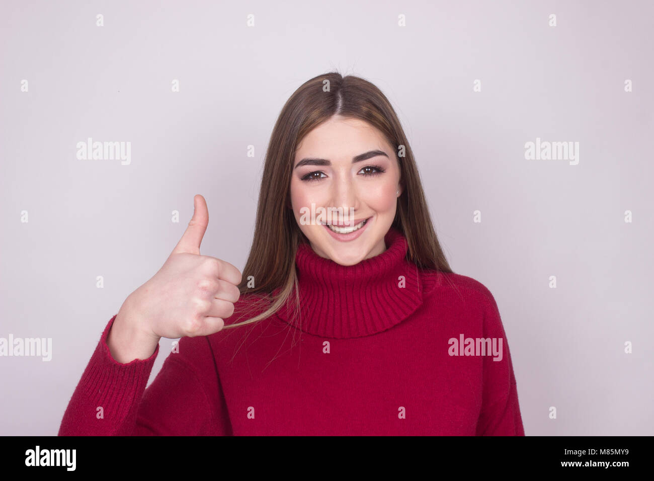 positive mind girl thumb up Stock Photo - Alamy