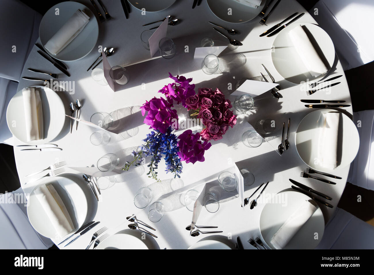Set up table in a restaurant Stock Photo - Alamy