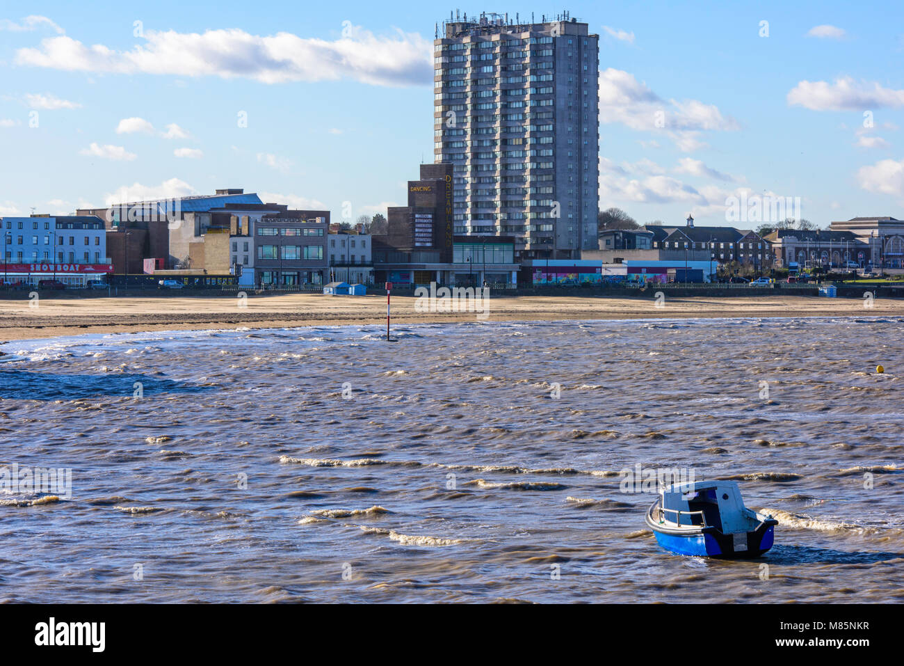 Margate seafront on a cloudy day. Arlington House, the big tower block ...