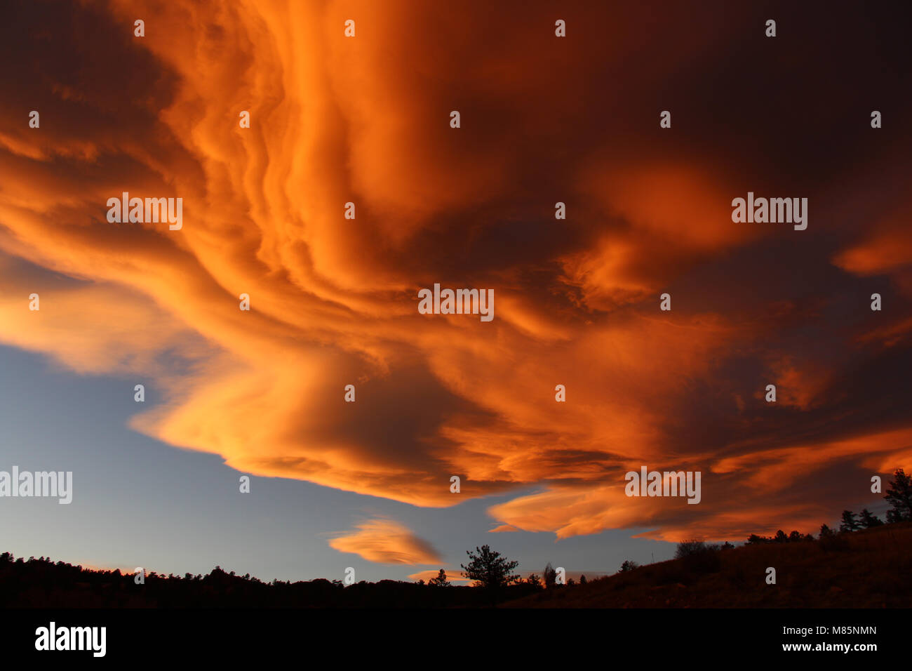 Dramatic clouds at sunset, lit from left Stock Photo - Alamy