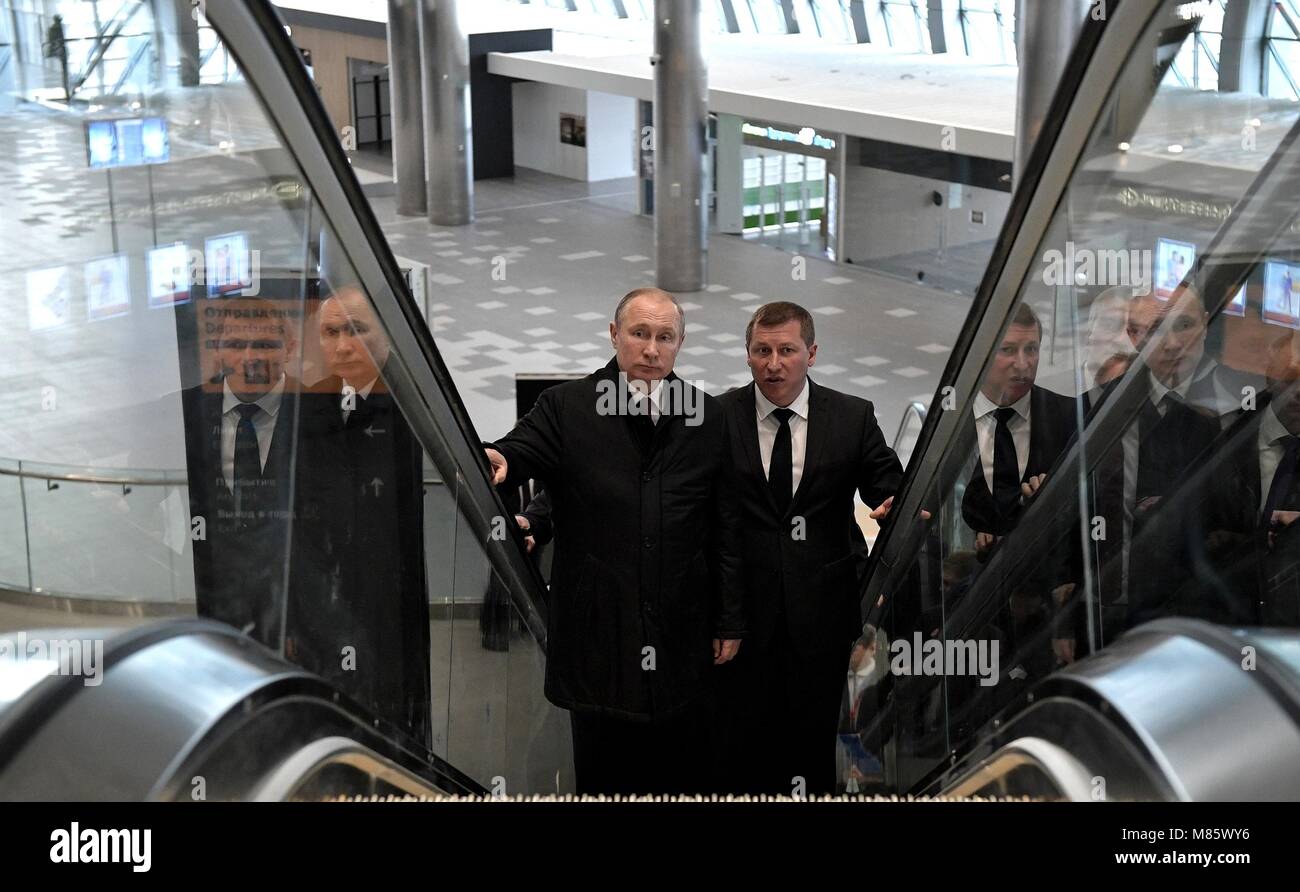 Russian President Vladimir Putin tours the new passenger terminal of ...