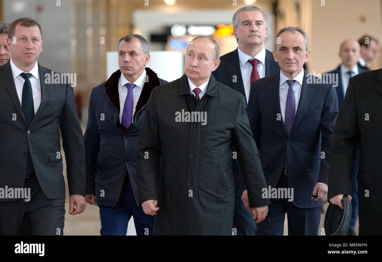 Russian President Vladimir Putin tours the new passenger terminal of ...
