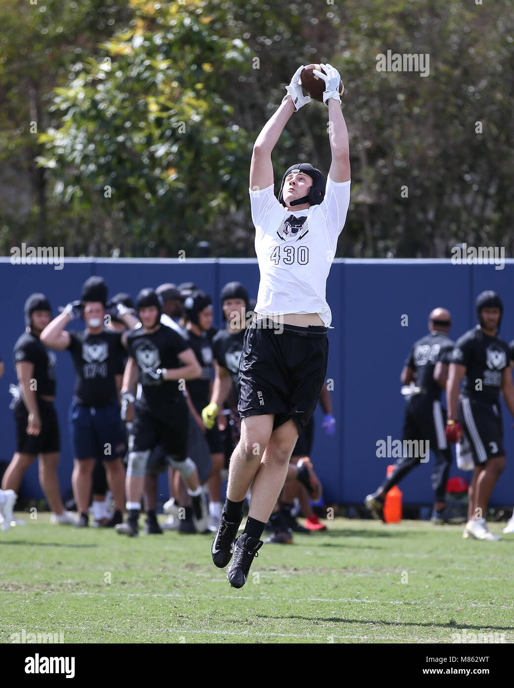 TE J Serra Jasper Lott #430 going up for a catch at the Nike Football ...