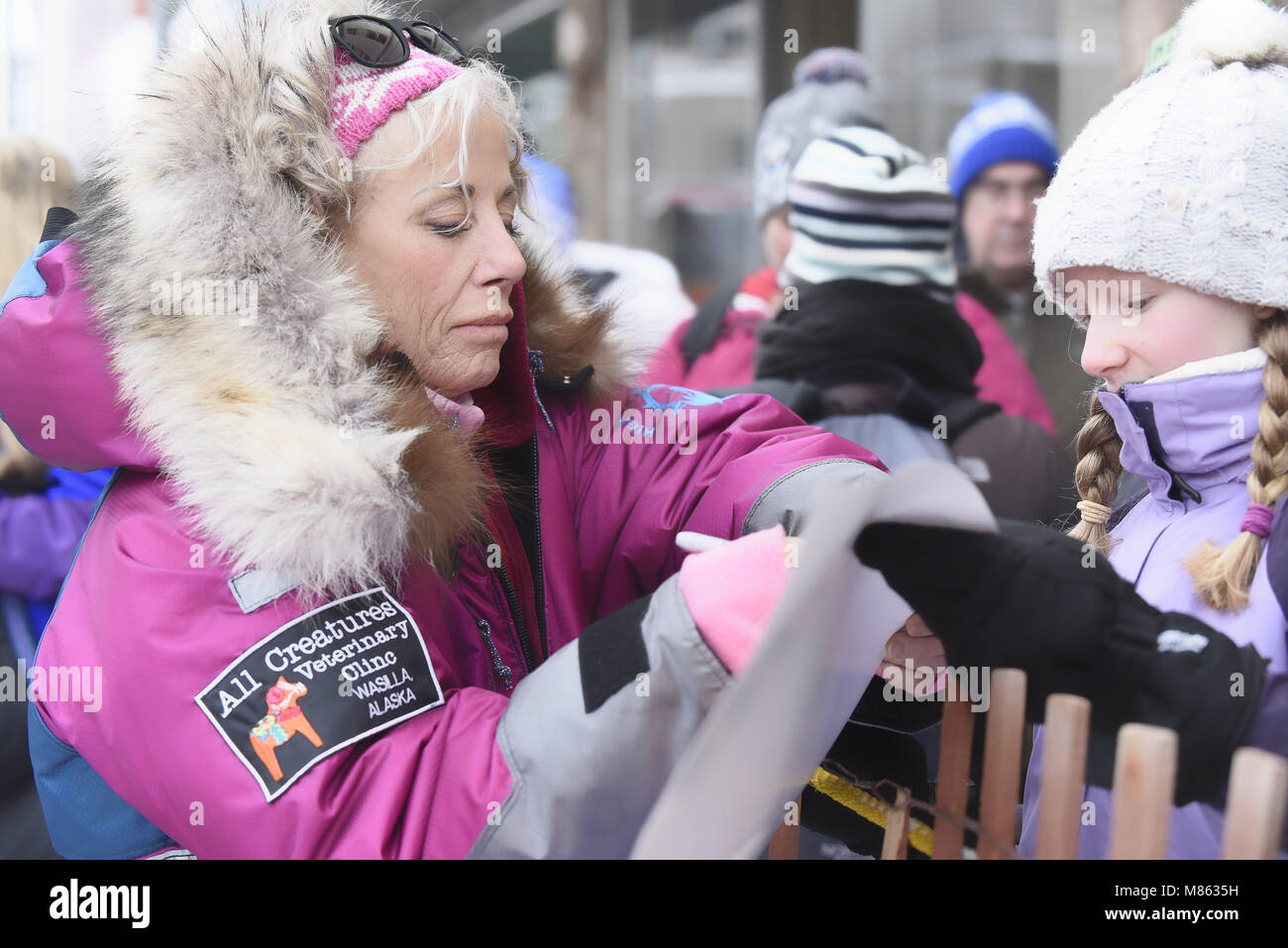 Anchorage, Alaska, Alaska, USA. 3rd Mar, 2018. Iditarod musher signs ...