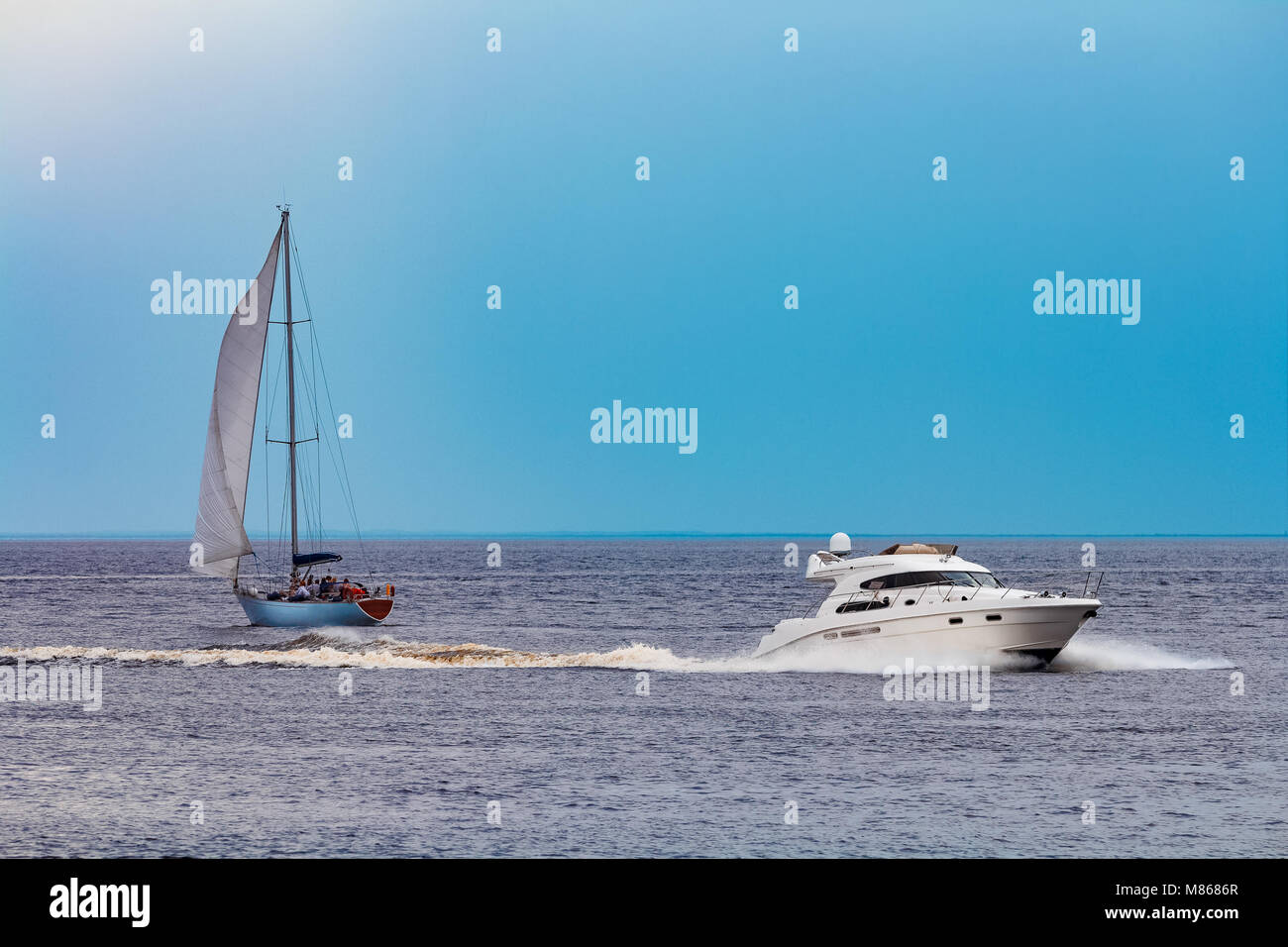 White speed boat moving fast to the Baltic sea. Water sport Stock Photo ...