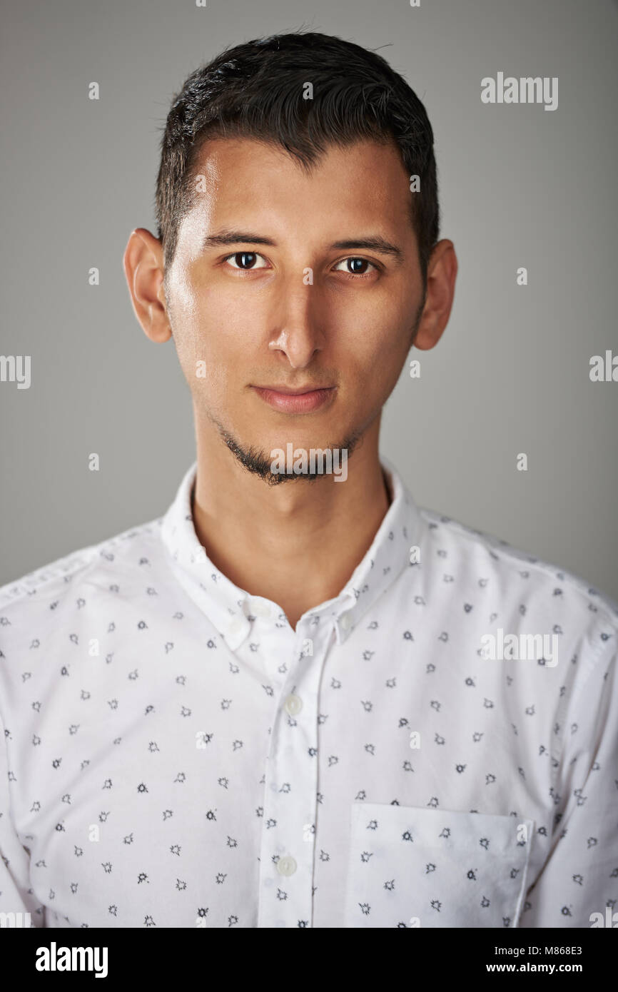 Young man with arab beard close up portrait Stock Photo - Alamy