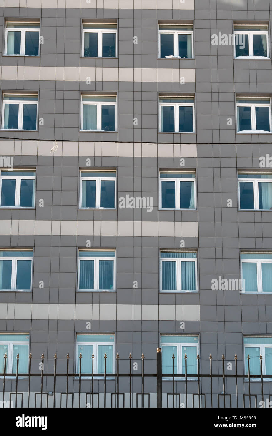 Windows on facade of a multi-storey building Stock Photo - Alamy