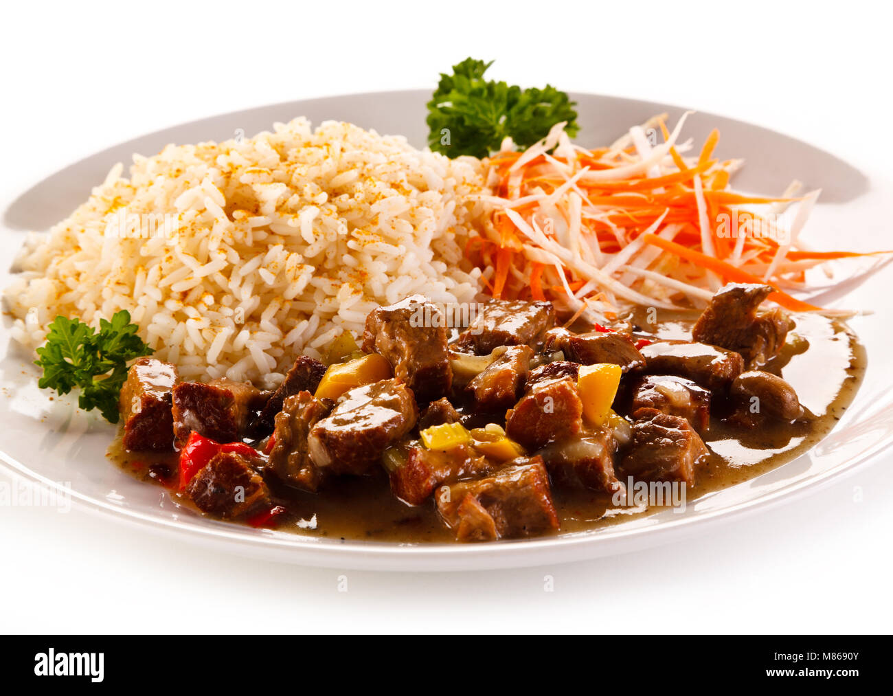 Roasted meat, white rice and vegetables Stock Photo - Alamy