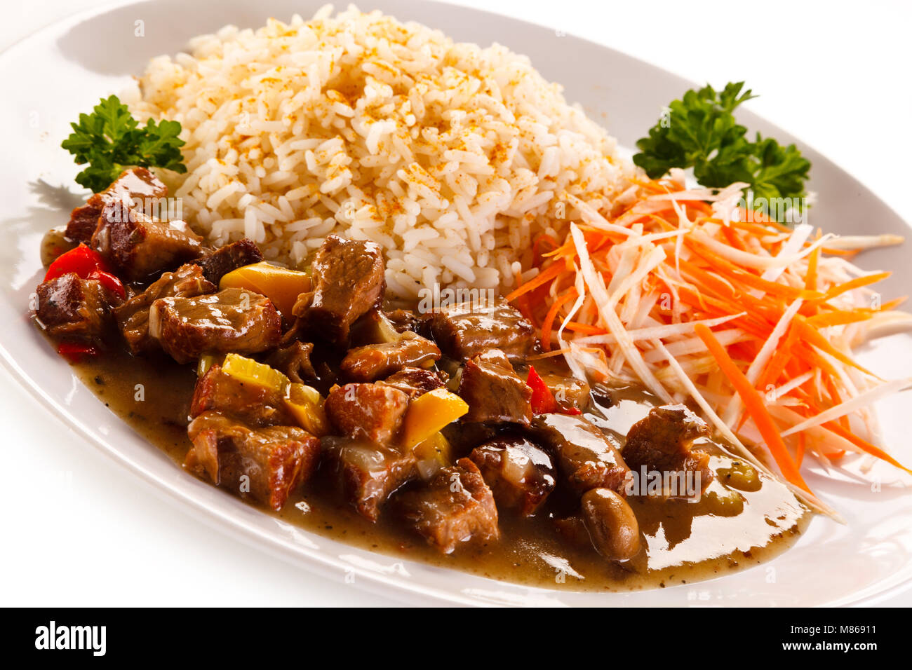 Roasted meat, white rice and vegetables Stock Photo - Alamy