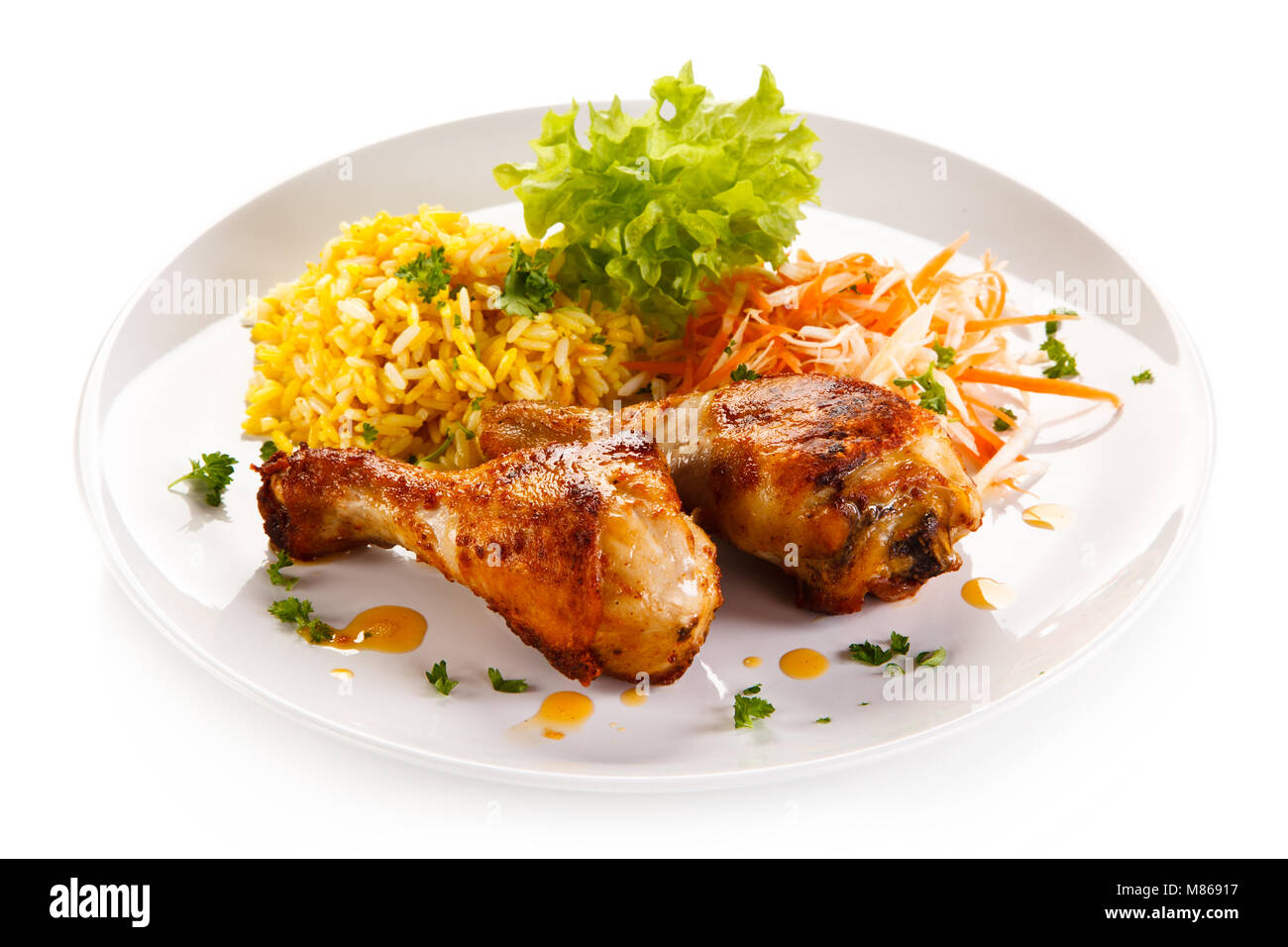 Roasted chicken drumsticks white rice and vegetables Stock Photo - Alamy
