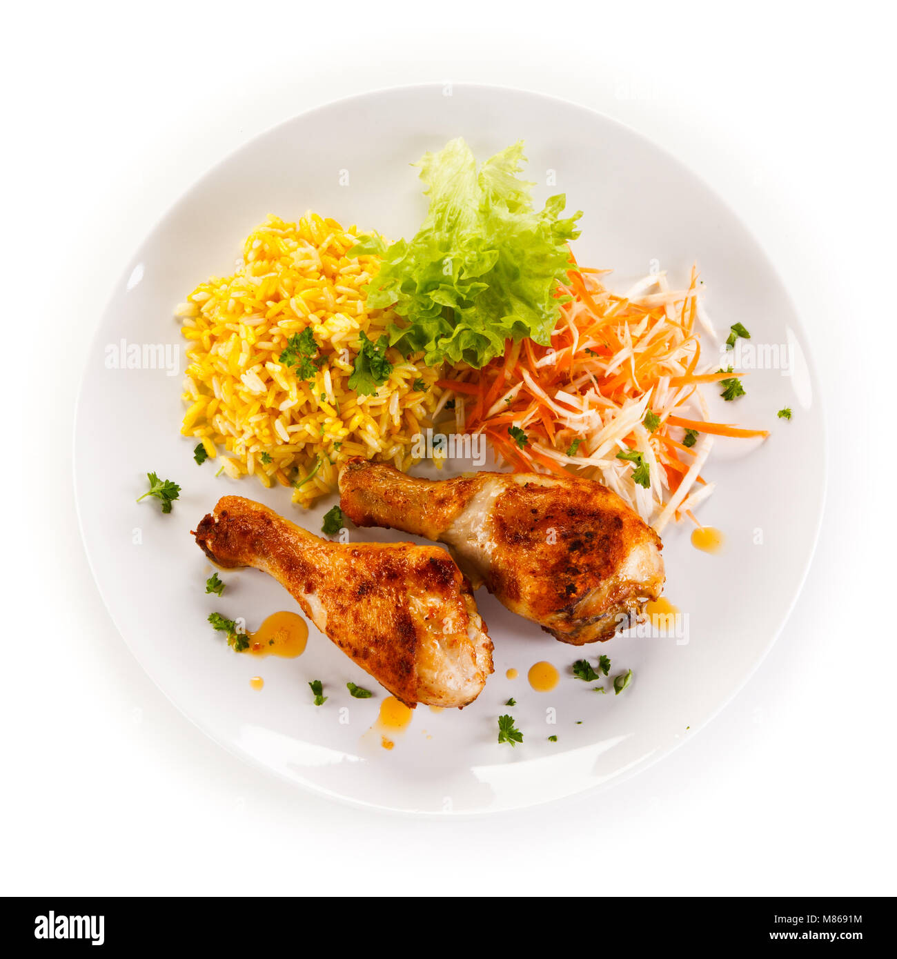 Roasted chicken drumsticks white rice and vegetables Stock Photo - Alamy