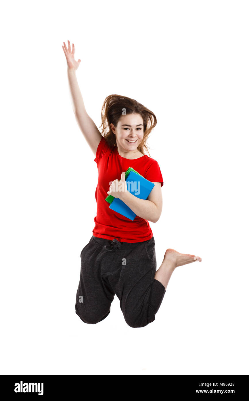 Young woman jumping on white background Stock Photo - Alamy