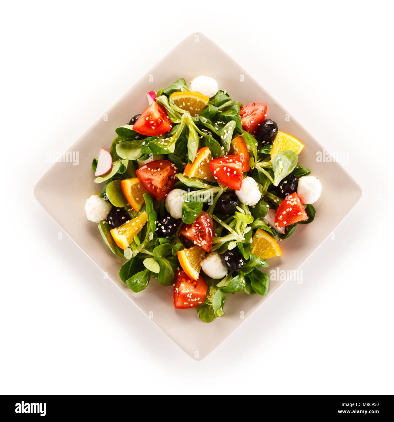 Caprese salad on white background Stock Photo - Alamy