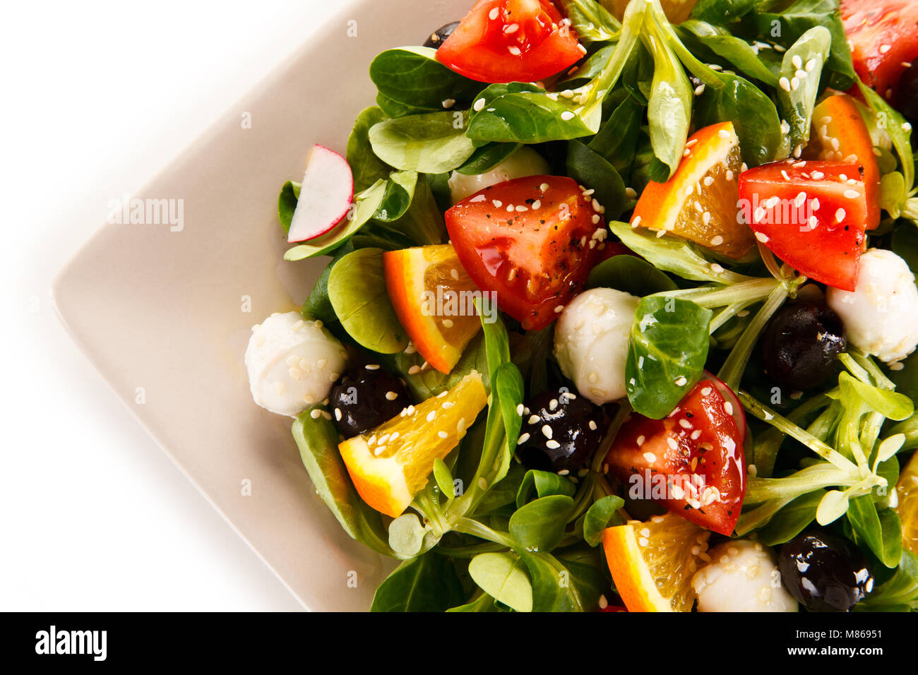Caprese salad on white background Stock Photo - Alamy