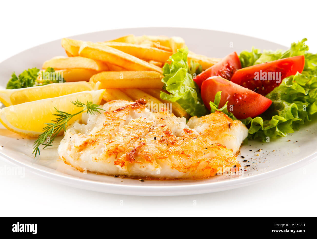 Fried fish fillet with french fries on white background Stock Photo - Alamy