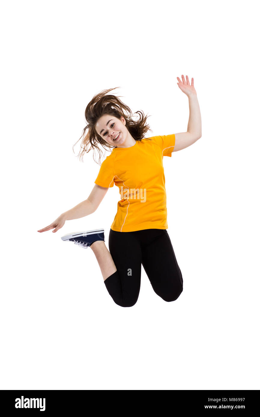 Young woman jumping on white background Stock Photo - Alamy